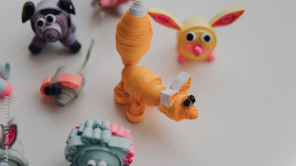 .Cartoon paper toys made by own hands close-up. Toys made by the ...