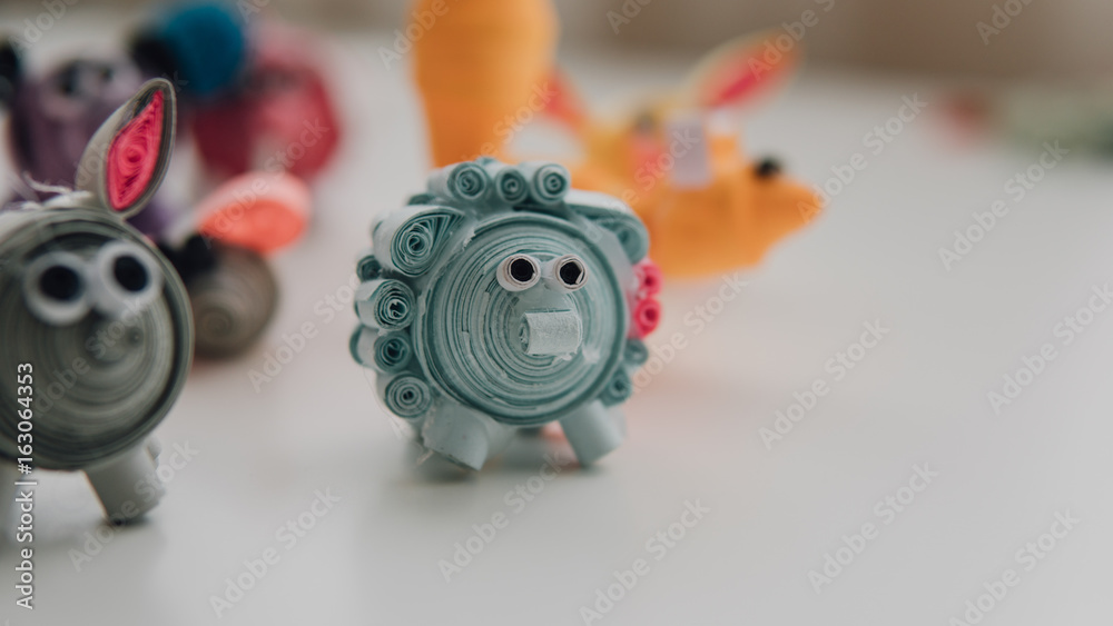 .Cartoon paper toys made by own hands close-up. Toys made by the ...