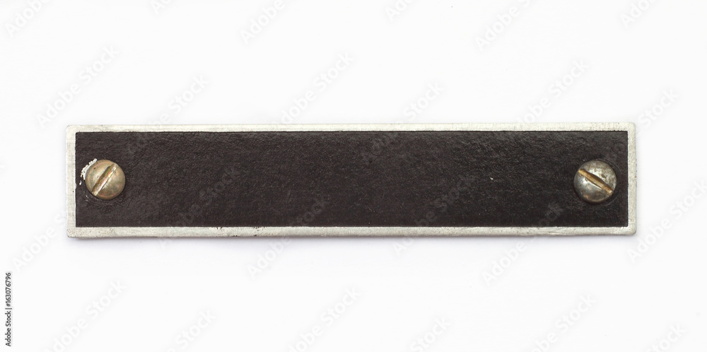 rectangular metal plate/ rectangular metal plate bolted on a light ...