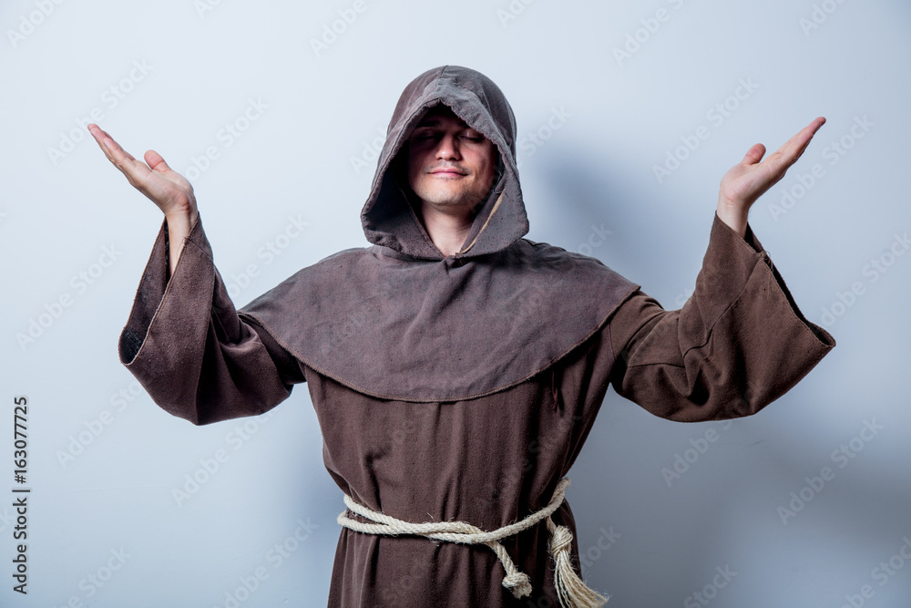 Portrait of Young catholic monk Stock Photo | Adobe Stock