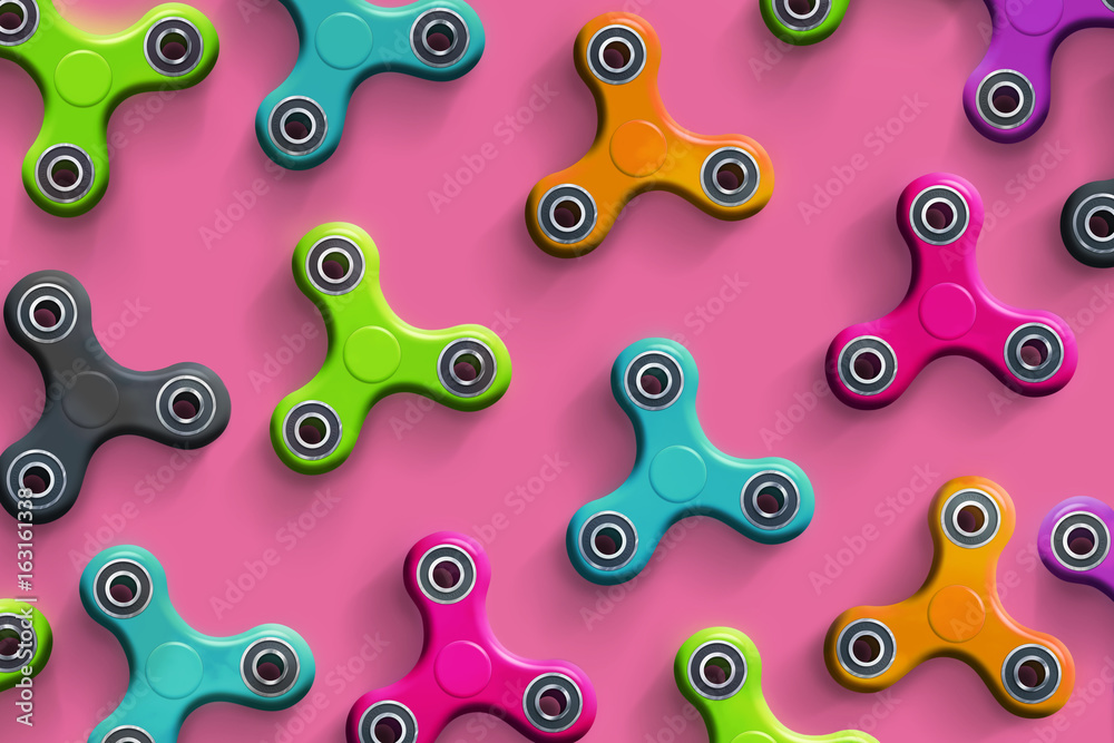 Fidget spinners on the pink background 3D illustration Stock Photo ...