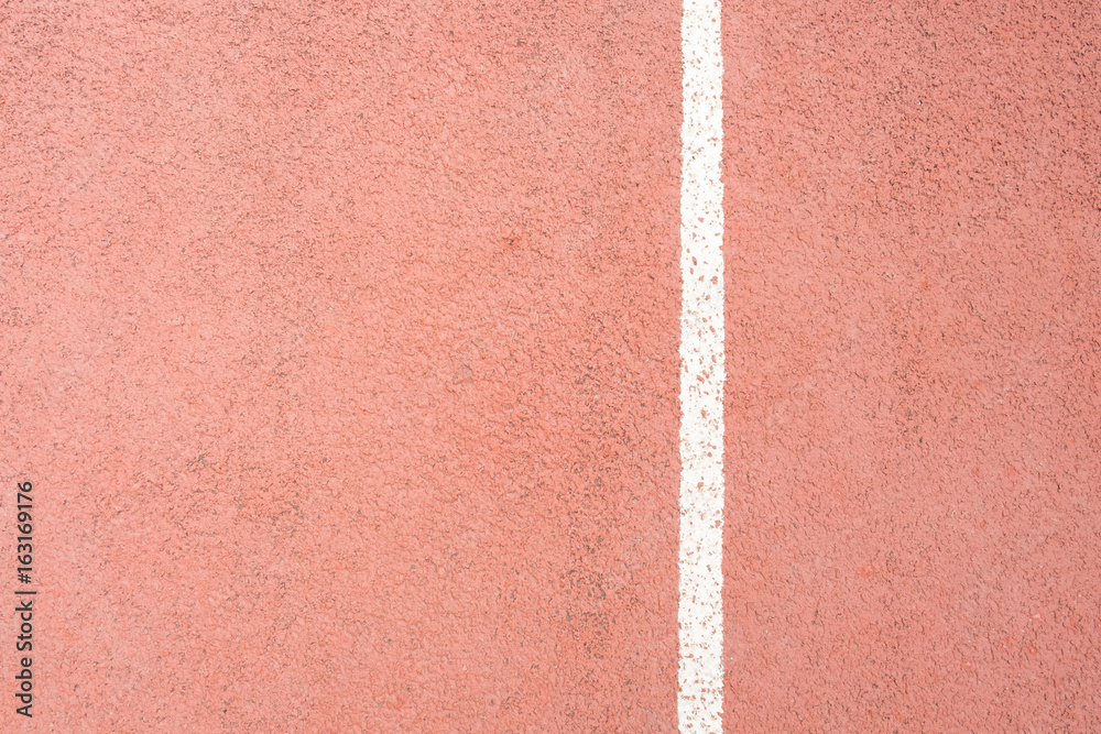 surface of the red running track in the stadium on top view for copy ...