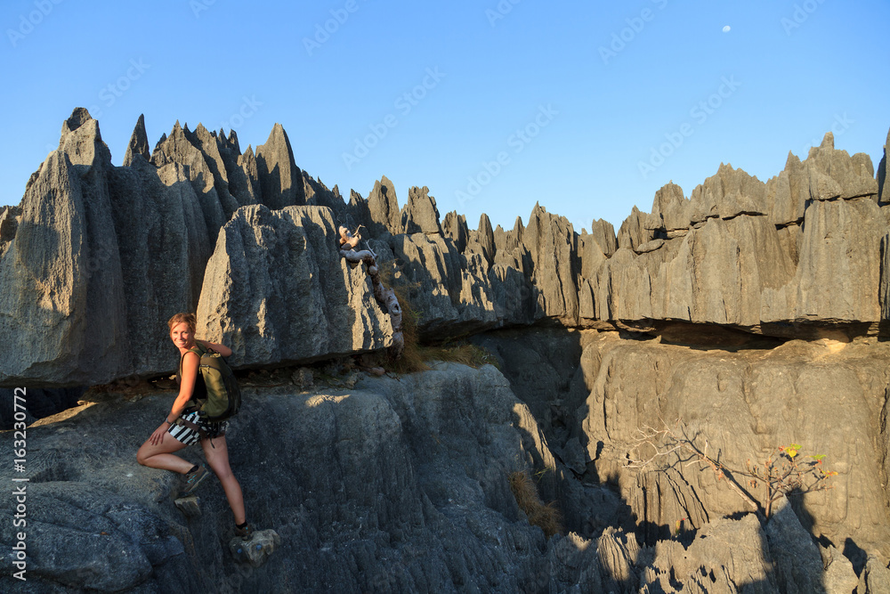Beautiful tourist on an excursion in the unique limestone landscape at ...