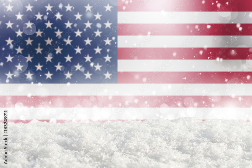 Defocused American flag as a winter Christmas background with falling ...