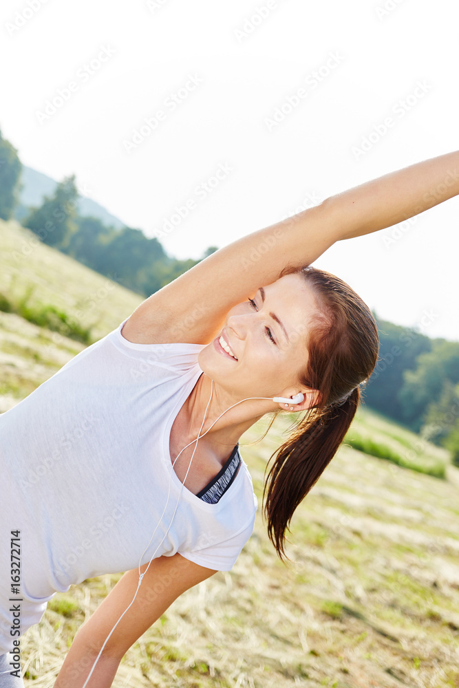 Junge Frau macht Gymnastik Stock Photo | Adobe Stock