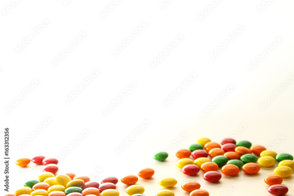 Rainbow candy / A variety of bite-sized chewy candies with a colorful ...