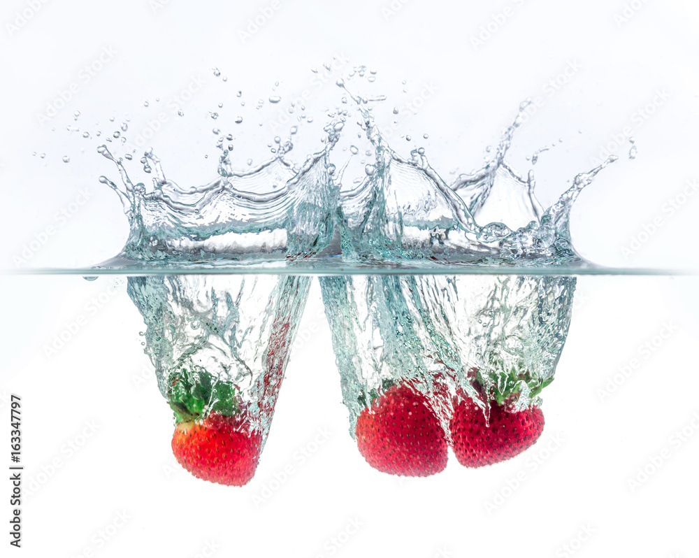fresh strawberry with water splash on white background Stock Photo ...