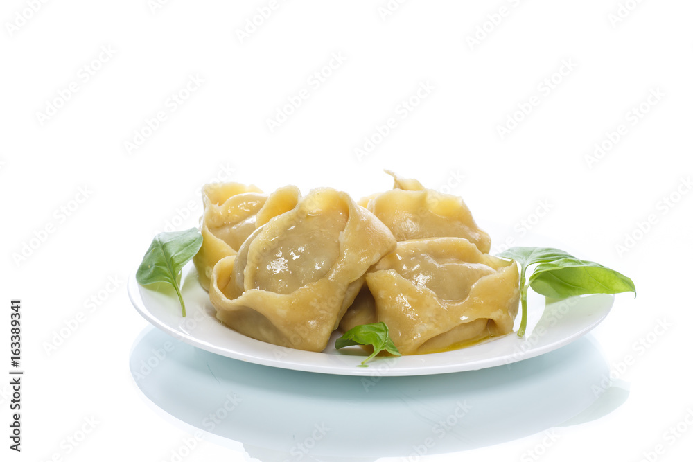 Boiled manti with meat on a plate Stock Photo | Adobe Stock