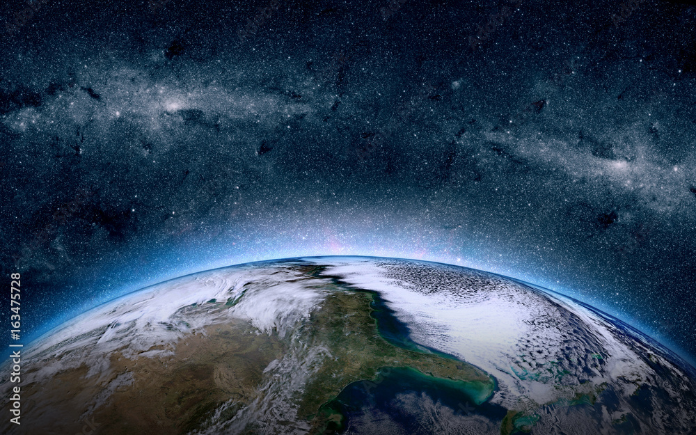 Earth in the space. Stars on the background. Place for text and ...