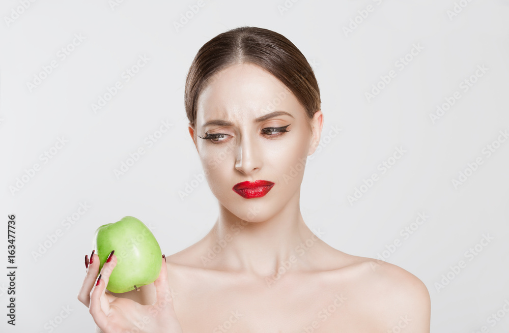 I am sick of this diet! Displeased young girl looking with disgust ...