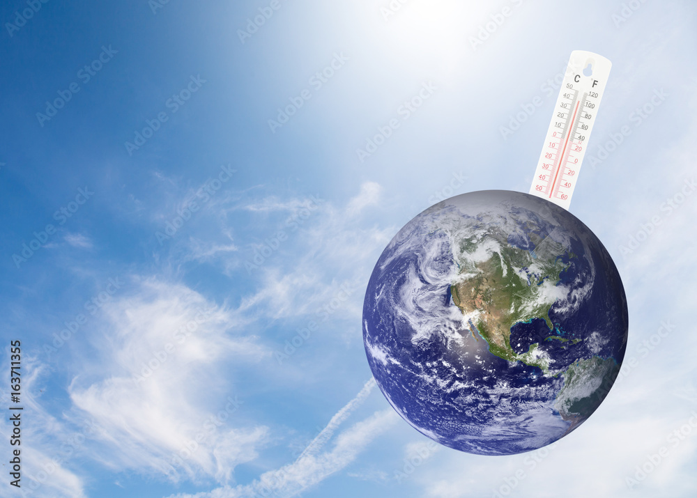 Foto de thermometer check the earth's temperature with impact of global ...