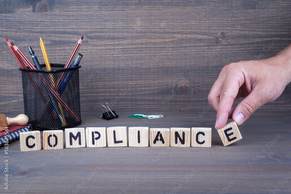 Compliance concept. Wooden letters on dark background Stock Photo ...