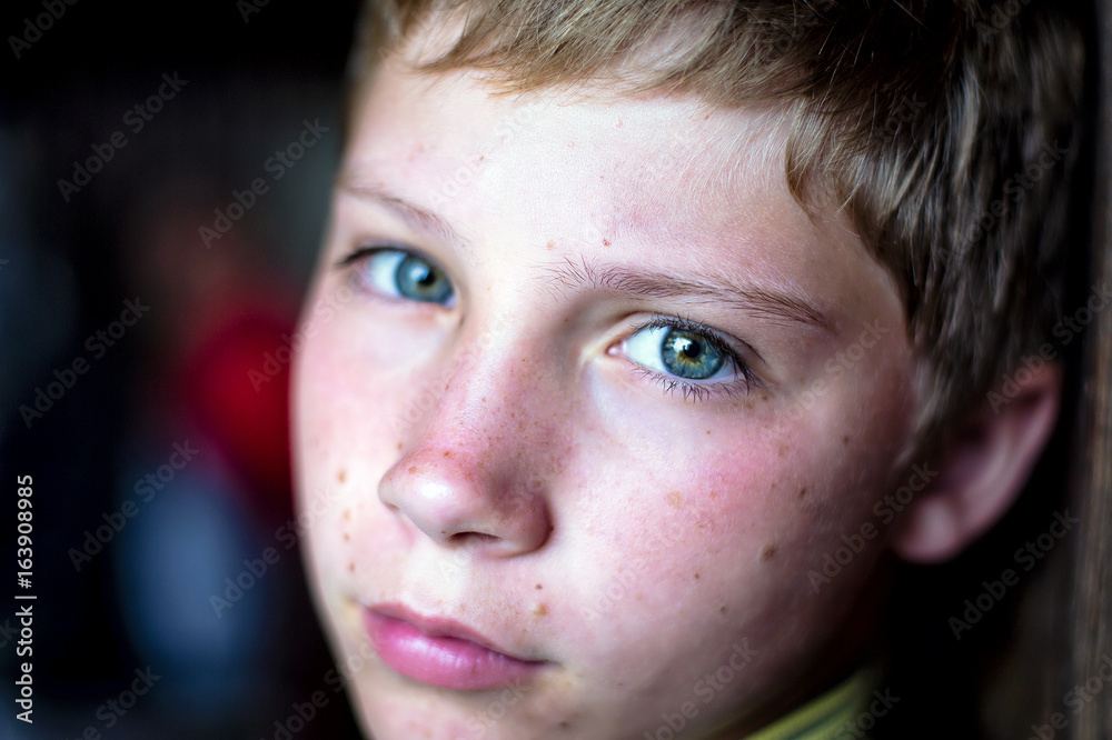 Sad boy's face. Shallow depth of field. Selective soft focus Stock Photo | Adobe Stock