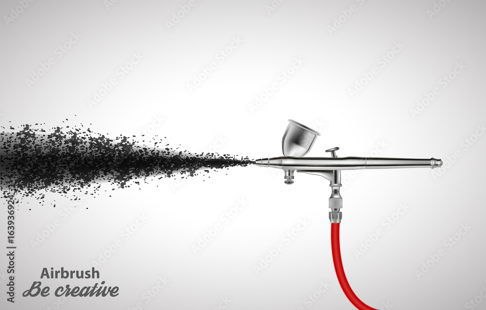 Close up of a airbrush paint sprayer isolated on white background ...