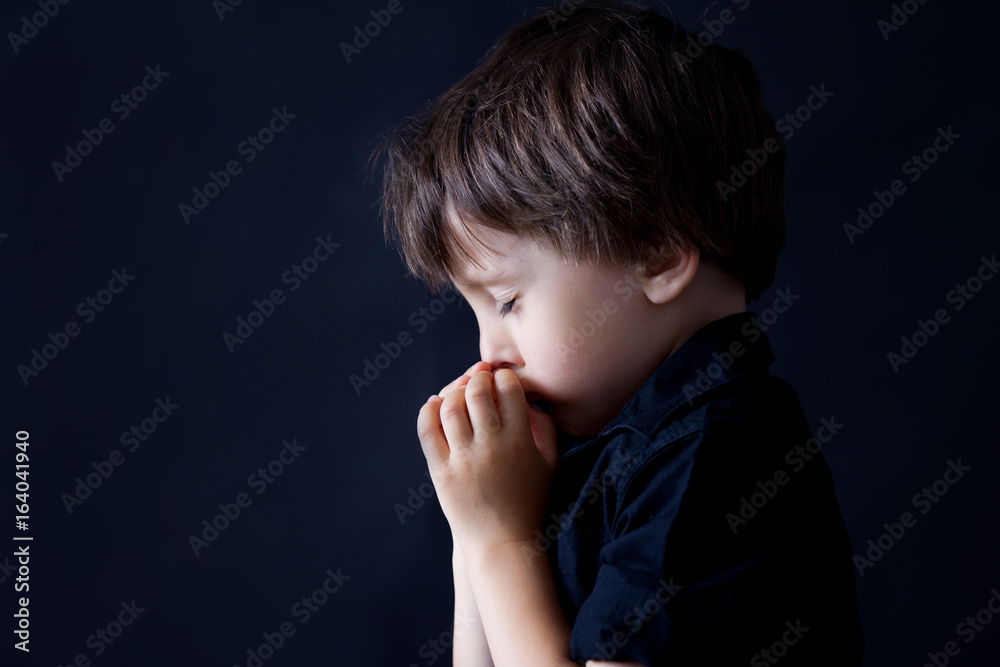 Little boy praying, child praying, isolated background Stock Photo ...