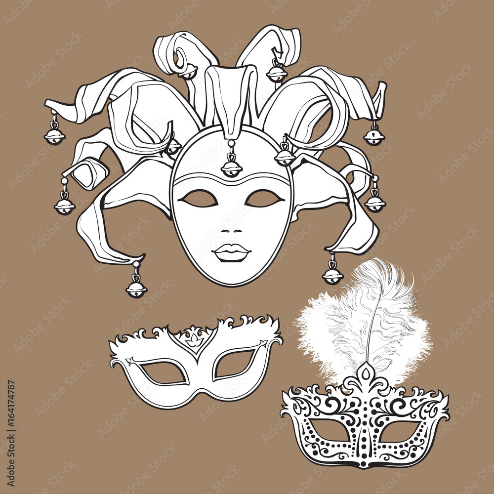 Set of three decorated Venetian carnival masks with feathers and bells ...