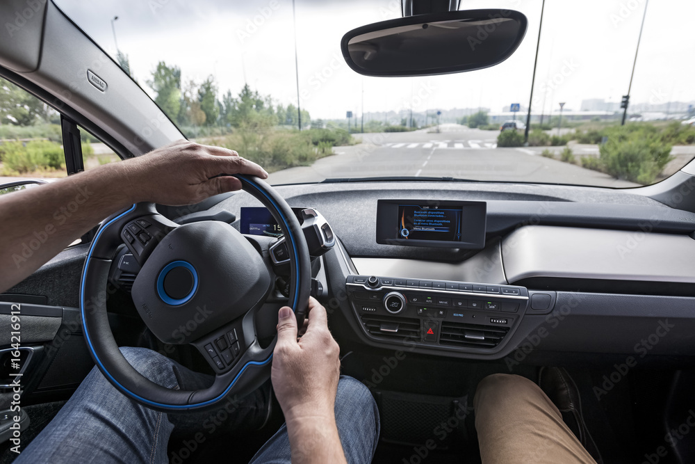 Conduciendo/ Driving Stock Photo | Adobe Stock