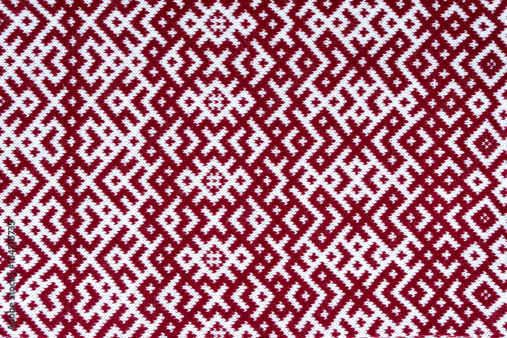 Knitted texture with the pattern of National symbol of Latvia ...