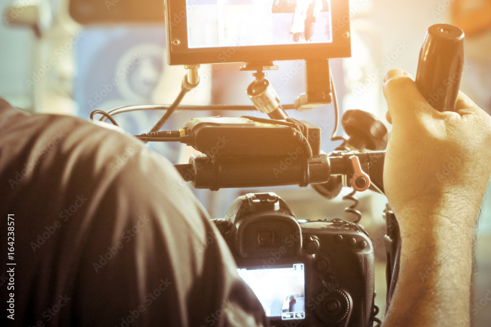 Cameraman with his video camera shooting, Hands Adjusting Camera,film ...
