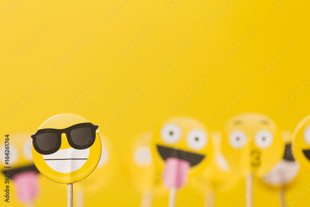 Emoji smiley social media characters on a yellow background Stock Photo ...