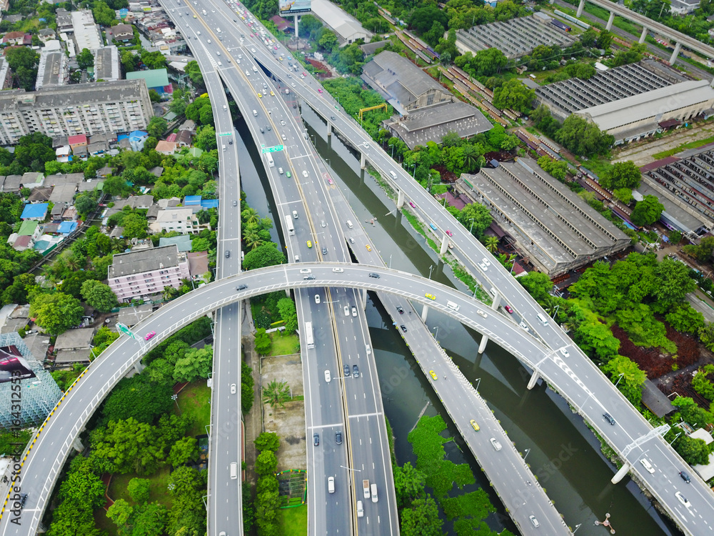 Aerial view from the drone on the highway of freeway and downtown with ...