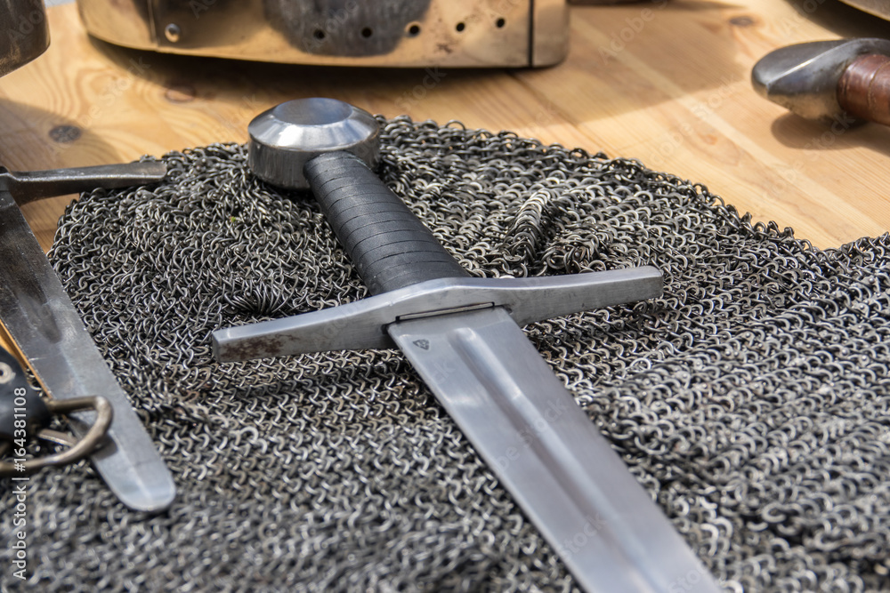 Medieval sword and Helmet, chainmail, sword and shields a medieval ...