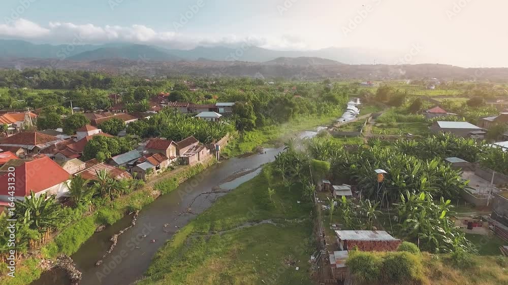 Aerial view of Bubunan town, Seririt, north Bali, mountains in ...