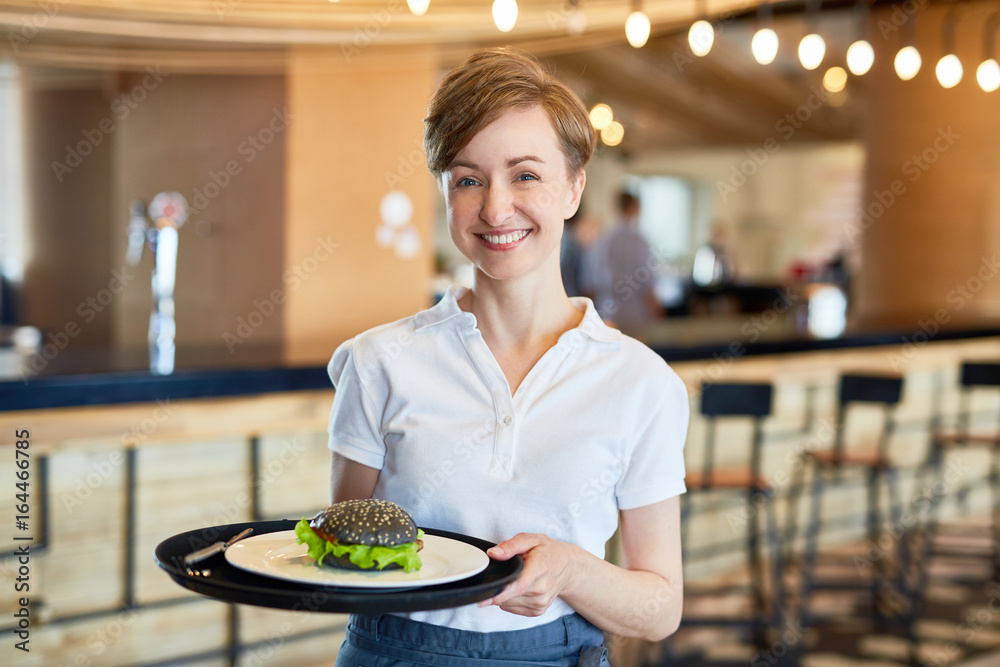 Fast-food cafe staff bringing tasty sandwich Stock Photo | Adobe Stock