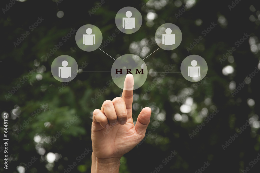 Male presses human resources management icon. Male presses HRM button ...