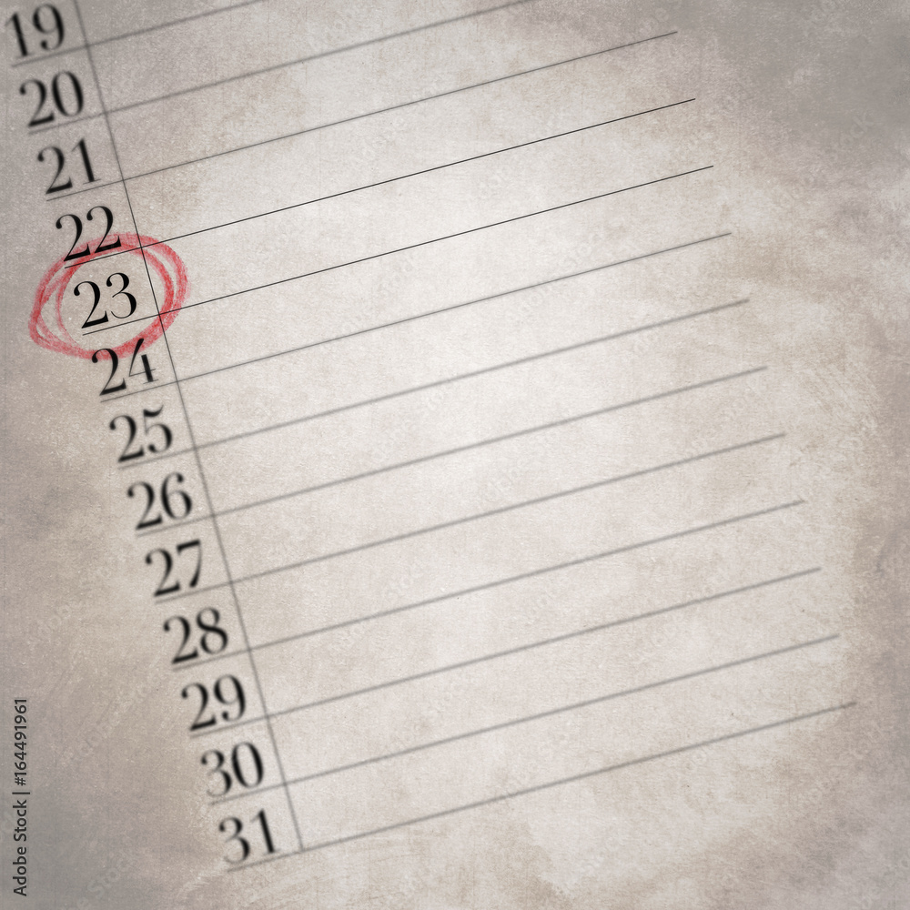 calendar with old texture shows the twenty third day of the month ...