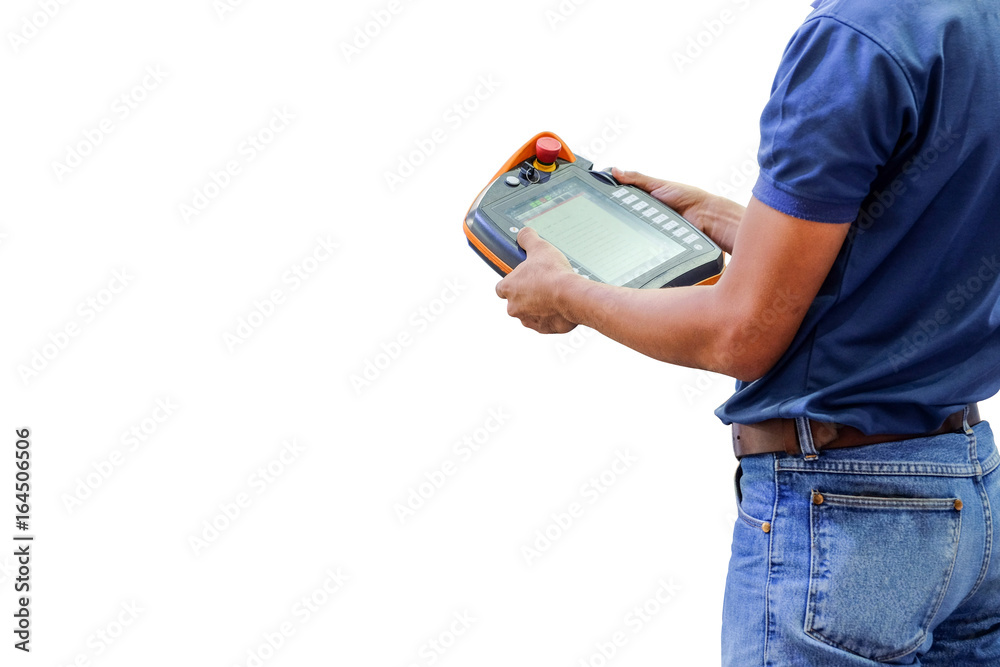 Engineers use a wireless remote control for robotics smart factory ...