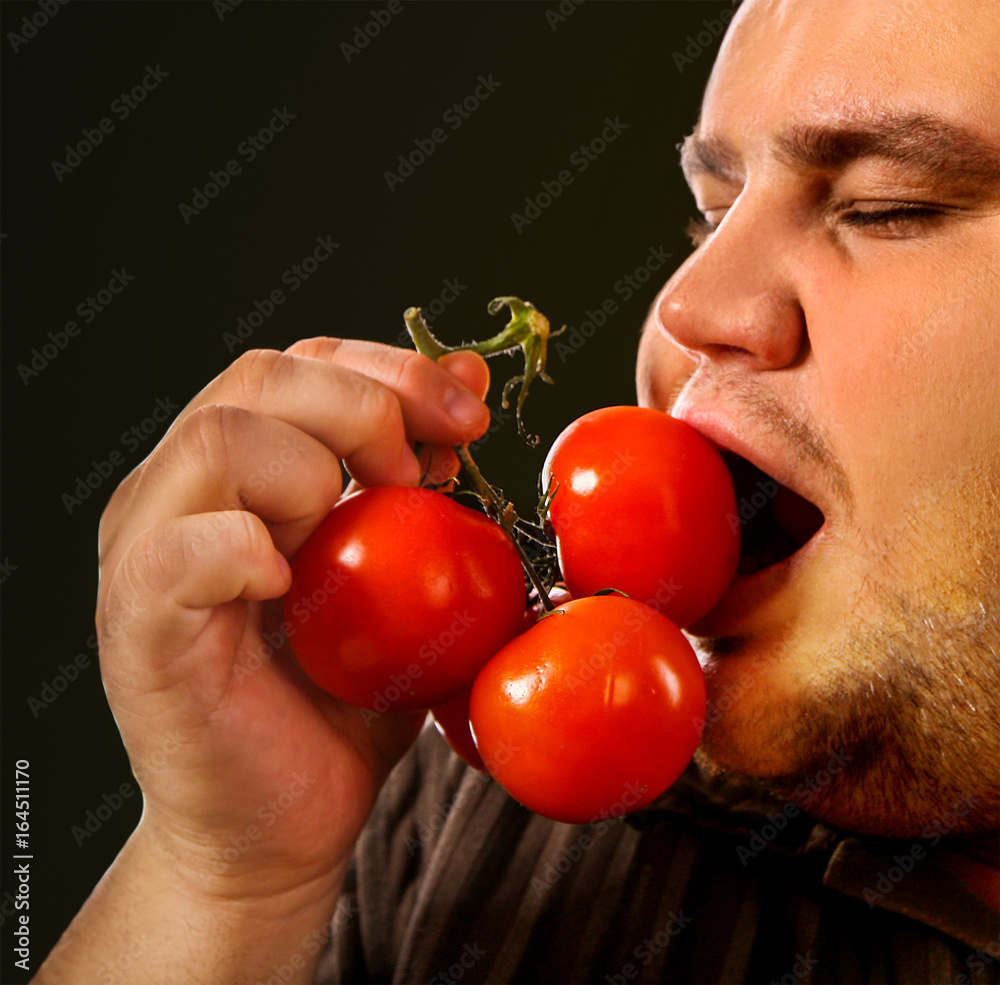 Diet fat man eating healthy food. Health breakfast with vegetables ...