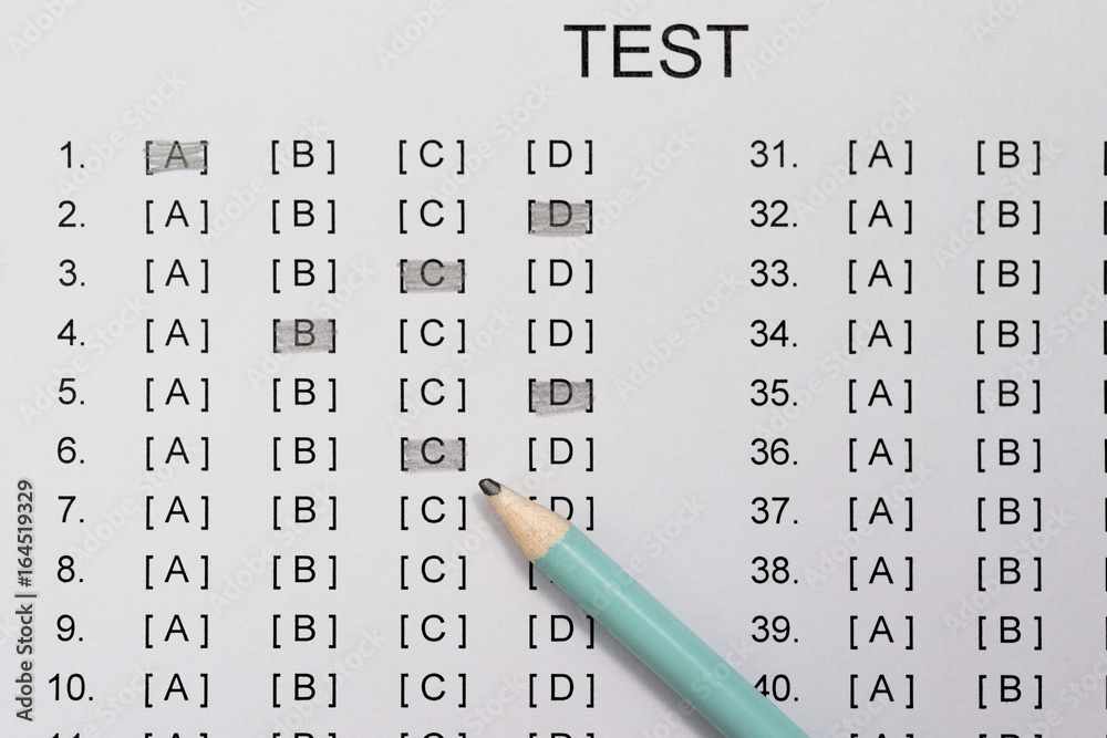 test score sheet with answers and pencil close up Stock Photo | Adobe Stock