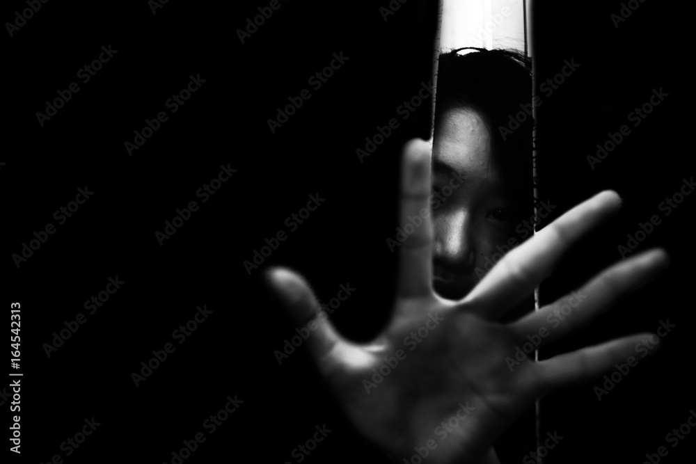 fear girl hiding in closet with hand reaching out Stock Photo | Adobe Stock