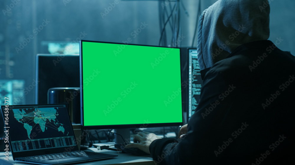 Close-up Shot of Teenage Hacker Working with Green Screen Mock-up ...
