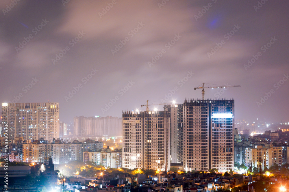 Skyscraper being built in the middle of the city of Noida, Delhi. The ...