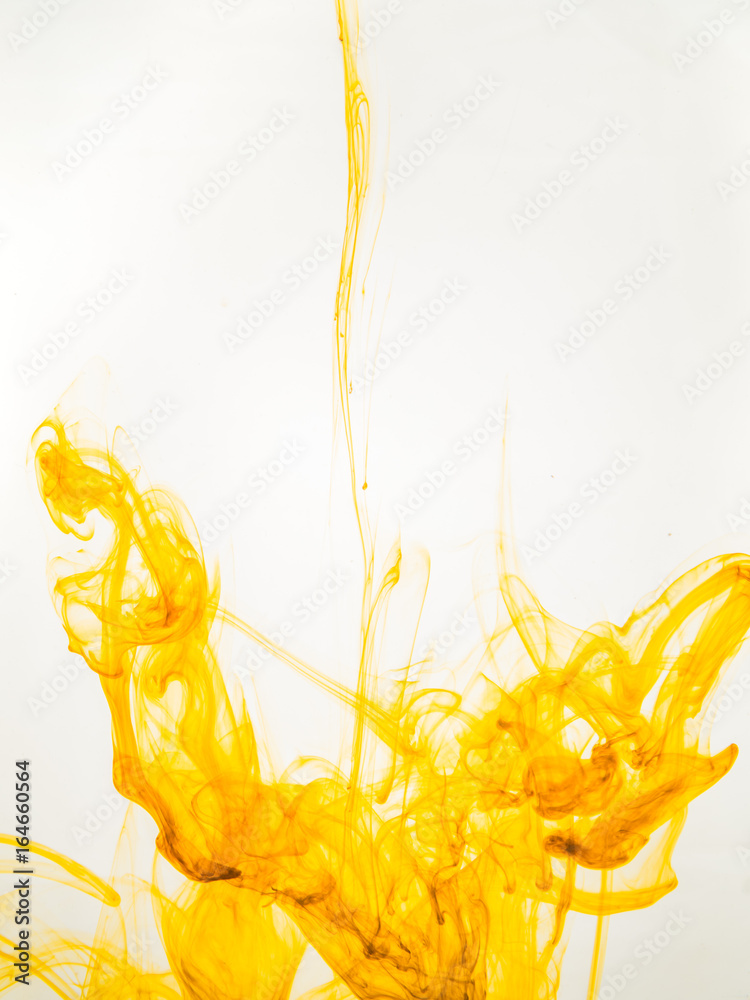 Ink swirl in a water on white background. The paint splash in the water ...