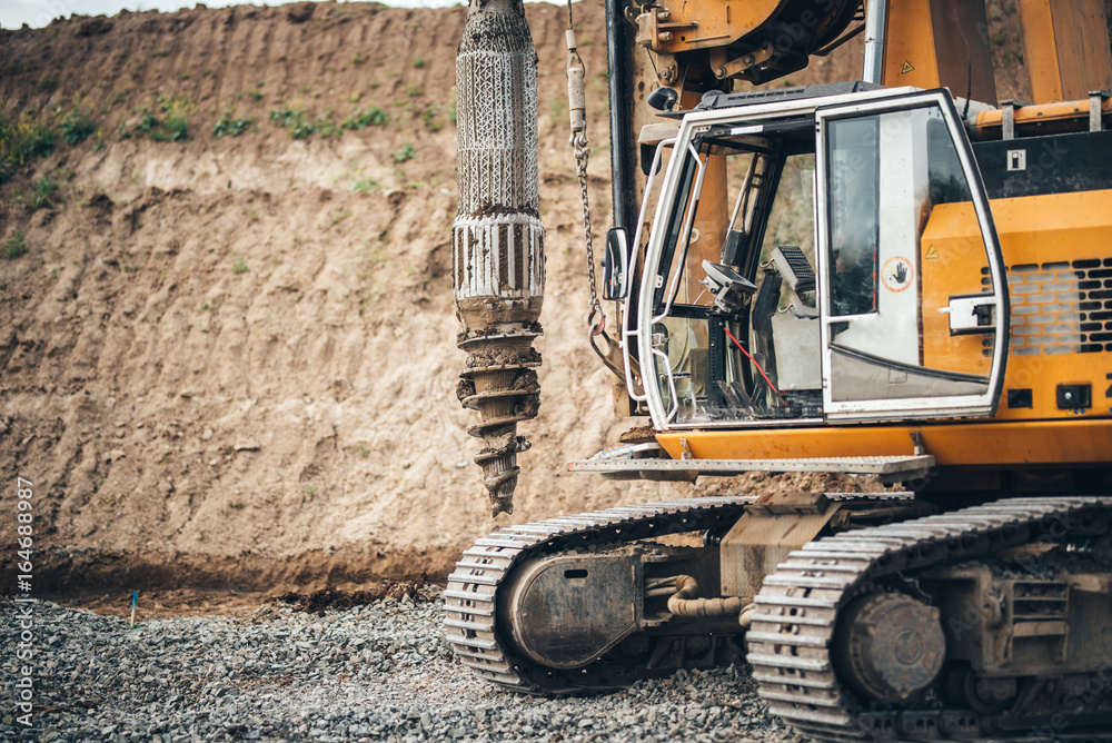 Construction site, highway building with industrial rotary drilling ...