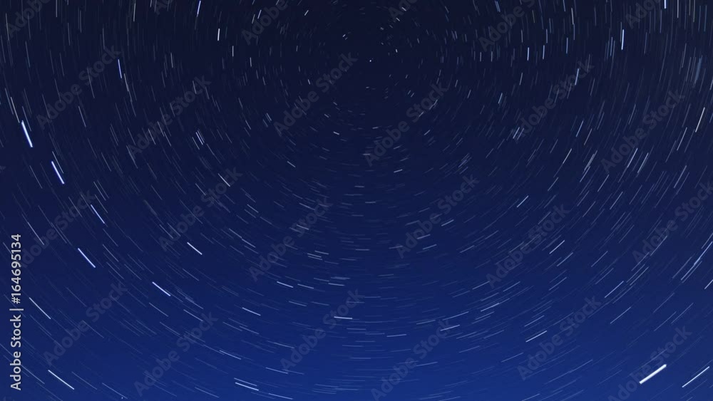 Moving stars trails at the night blue sky Stock Video | Adobe Stock