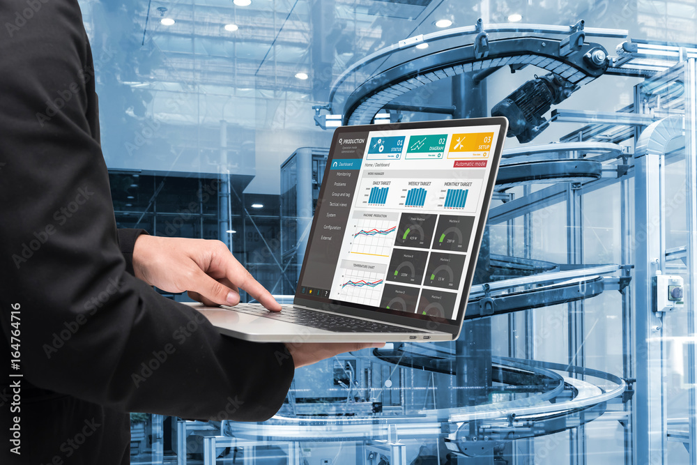Foto de Male manager hand laptop for check real time production ...