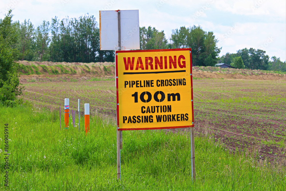 Warning Pipeline Crossing Caution sign Stock Photo | Adobe Stock