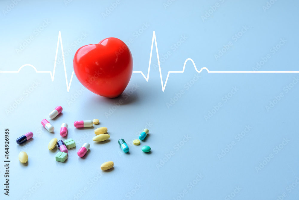 Red heart shape with electrocadiogram (EKG or ECG) chart and colorful ...