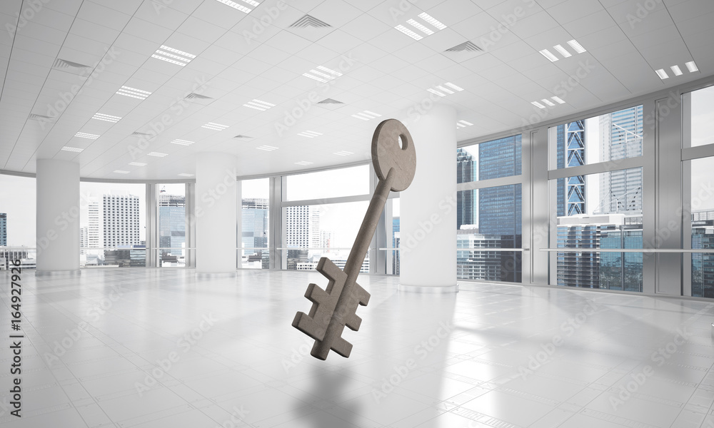 Conceptual background image of concrete key sign in modern office ...