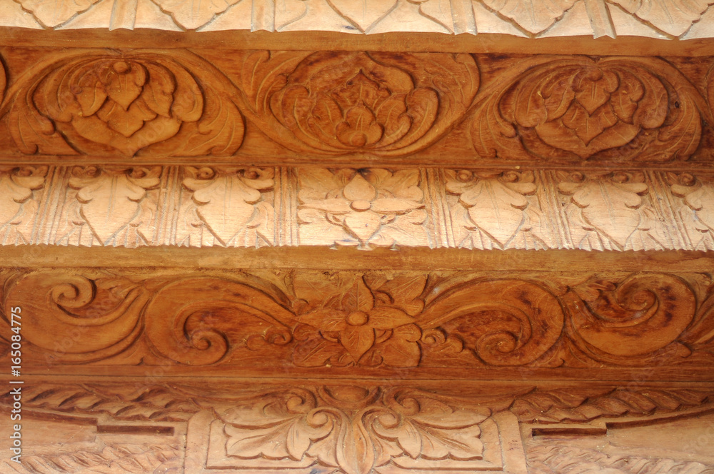 Wood carving detail with floral motif at old Mosque of Masjid Besar ...