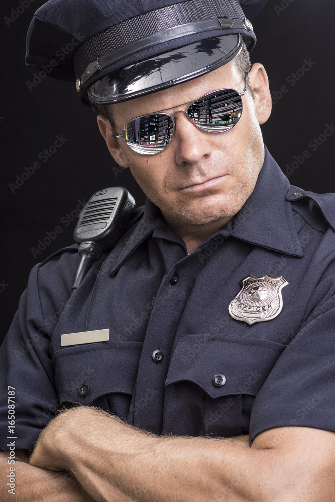 Tough uniformed street cop Stock Photo | Adobe Stock