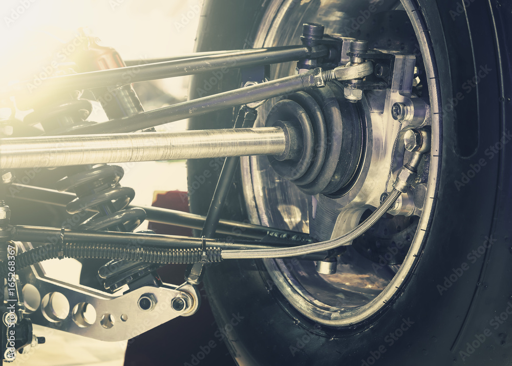 Front wheel of drive car with new tire and Shock Absorber Stock Photo ...
