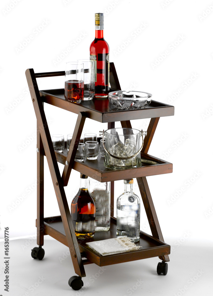 folding trolley serving alcoholic drinks, on white background Stock ...