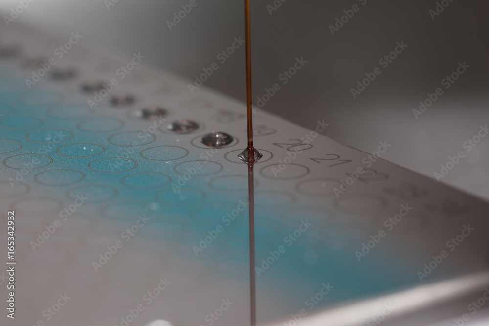 Pipetting of MALDI-TOF target in laboratory, mass-spectrometry Stock ...