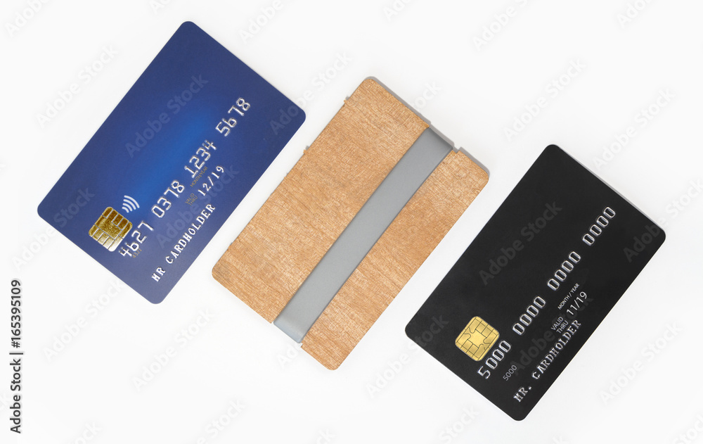 Blank blue and black credit cards and stylish wooden card holder Stock ...