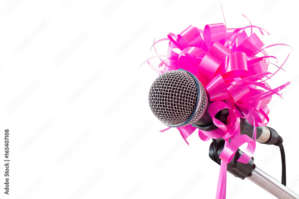 chrome microphone and stand with pink bow isolated on white background ...